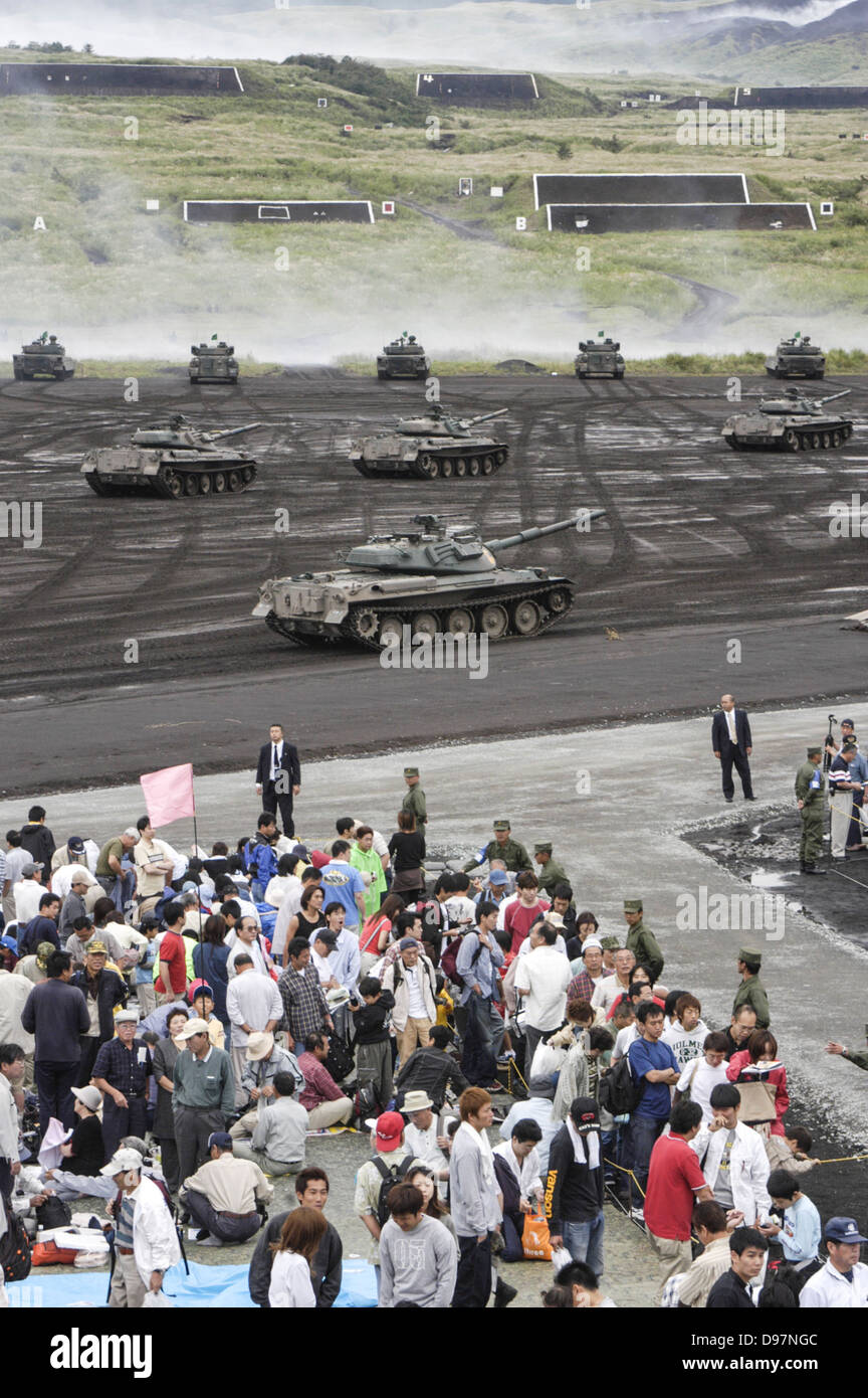 Spectators watch as Japan Ground Self-Defense Forces (GSDF) take part ...