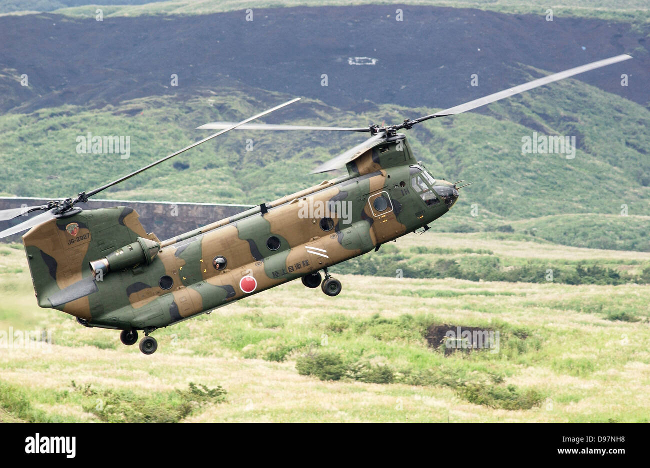 A helicopter of the Japan Ground Self-Defense Forces takes part in a ...