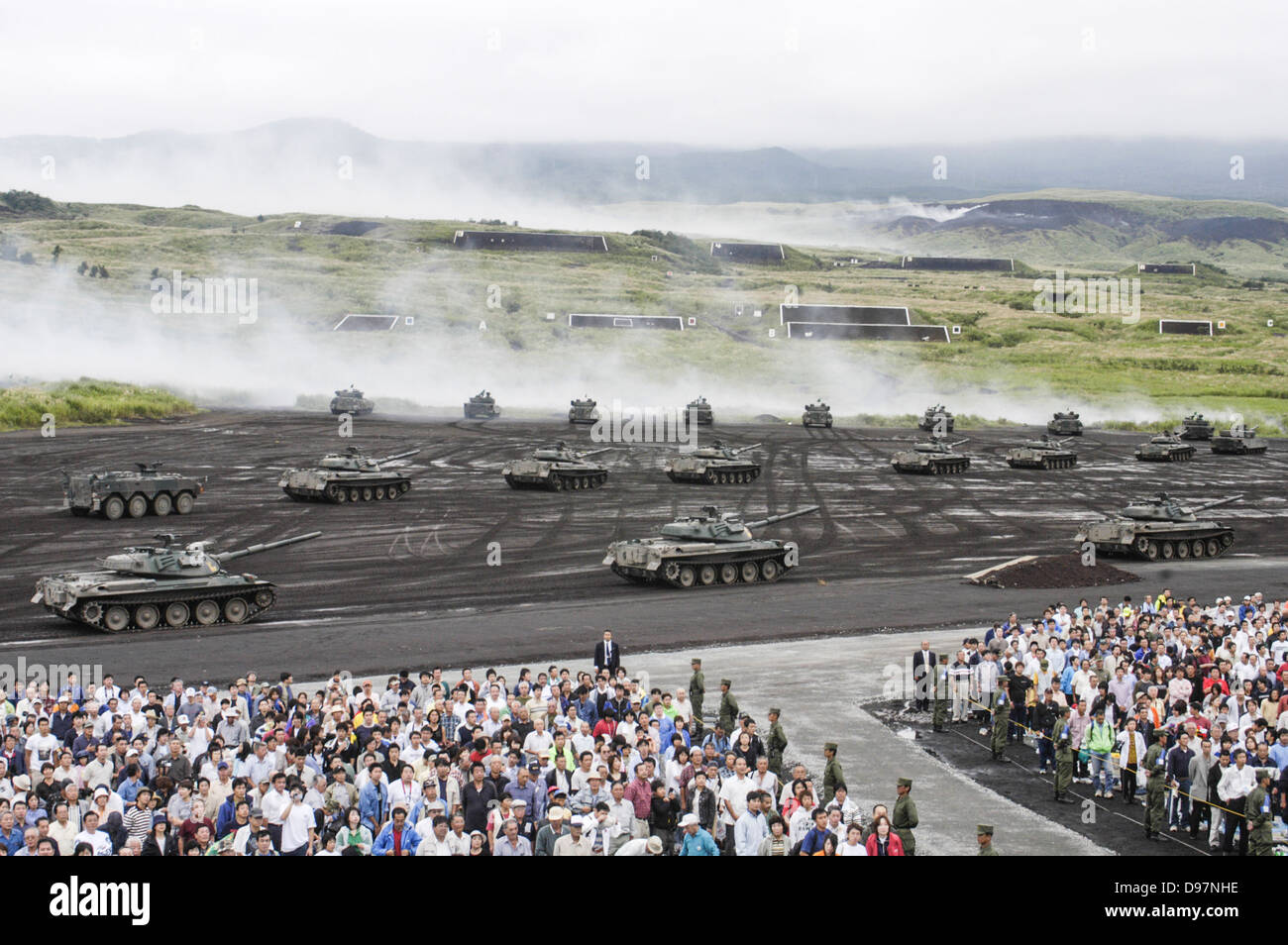 Spectators watch as Japan Ground Self-Defense Forces (GSDF) take part ...
