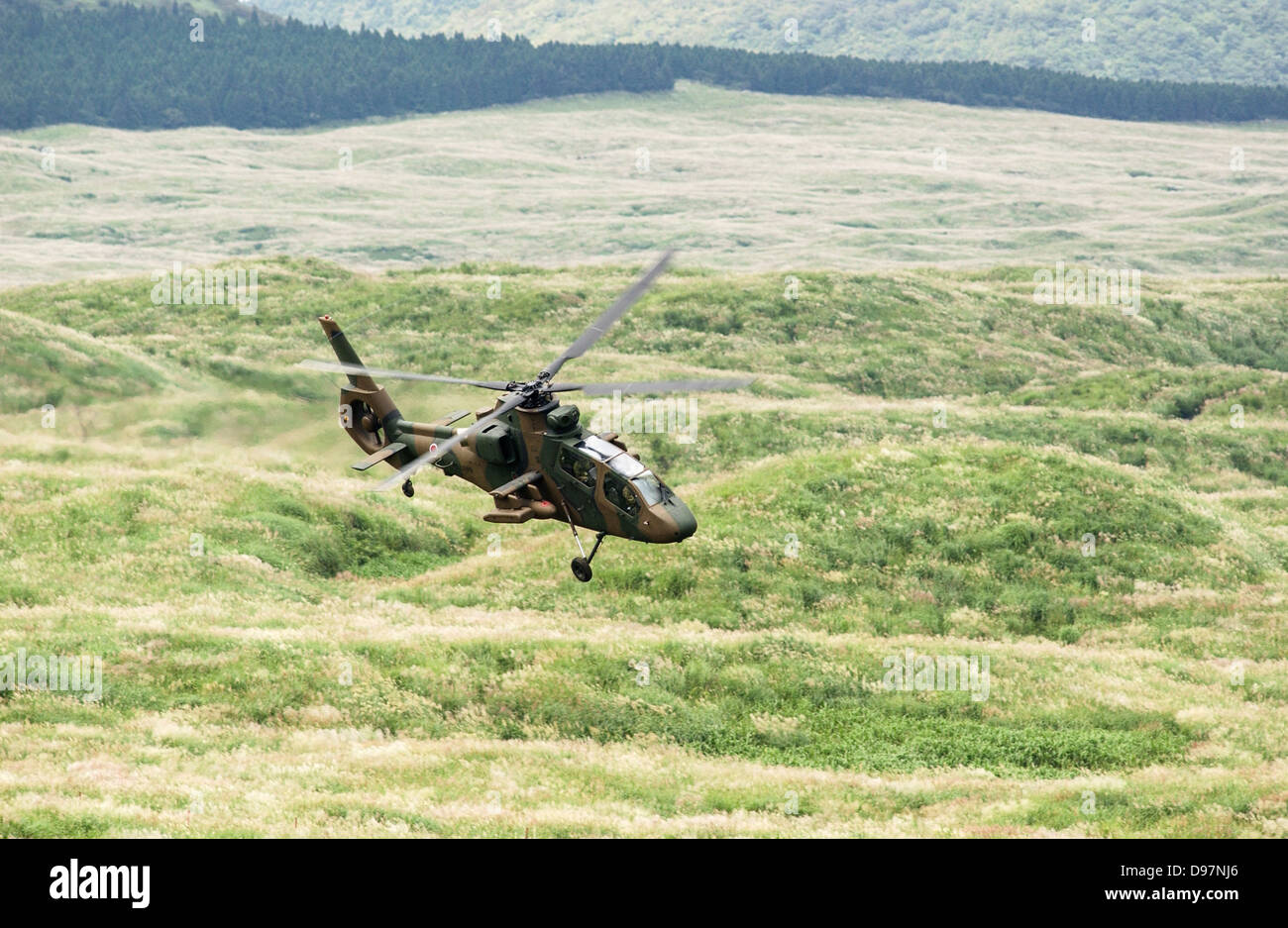 A helicopter of the Japan Ground Self-Defense Forces takes part in a ...