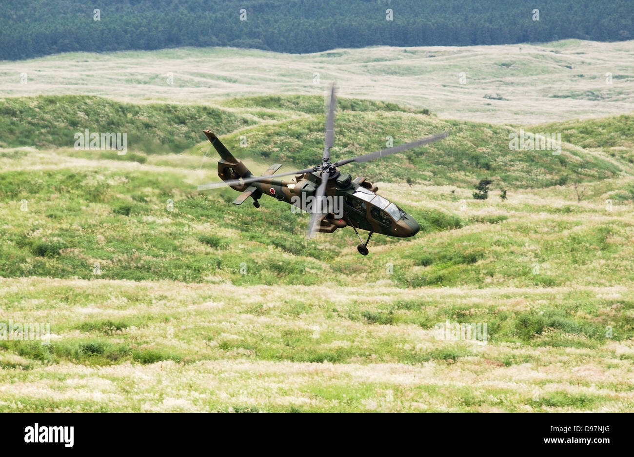 A helicopter of the Japan Ground Self-Defense Forces takes part in a ...