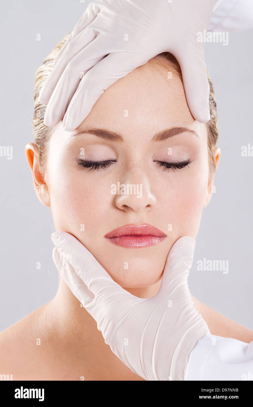 young woman skin check before plastic surgery Stock Photo - Alamy