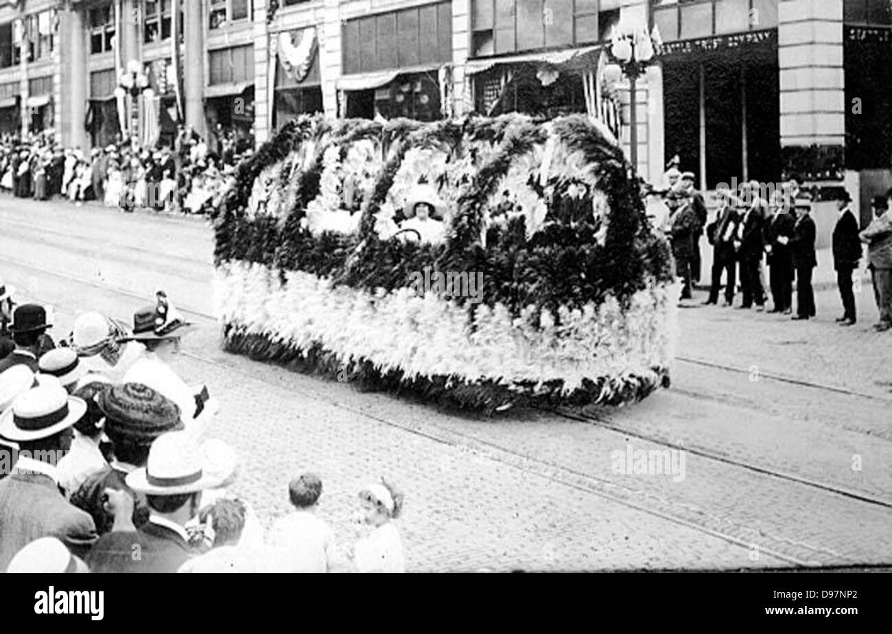 The photograph shows a float from the Seattle Potlatch Parade, an ...