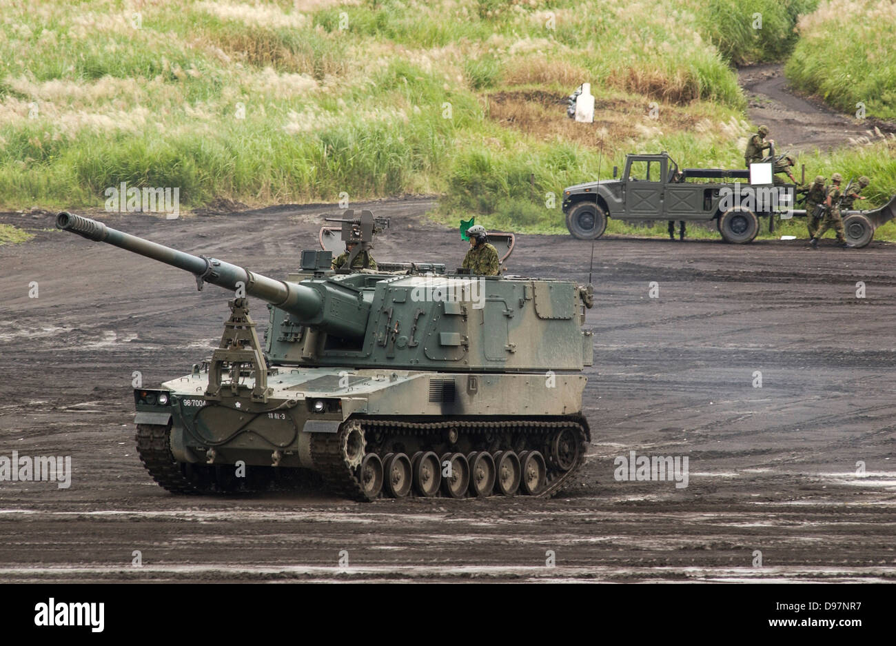 Japan Ground Self-Defense Forces (GSDF) take part in a live fire ...