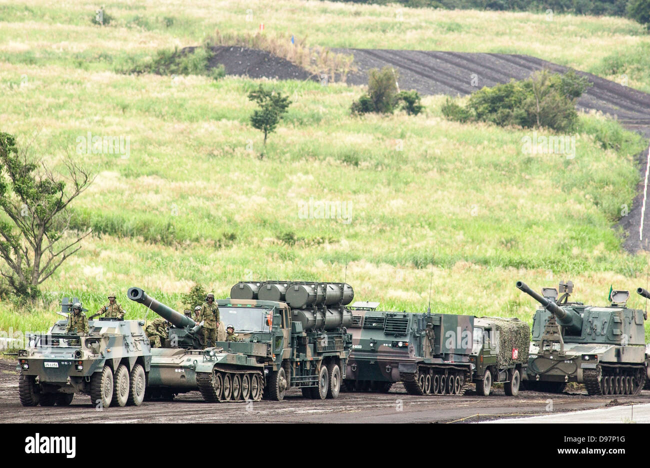 Japan Ground Self-Defense Forces (GSDF) take part in a live fire ...