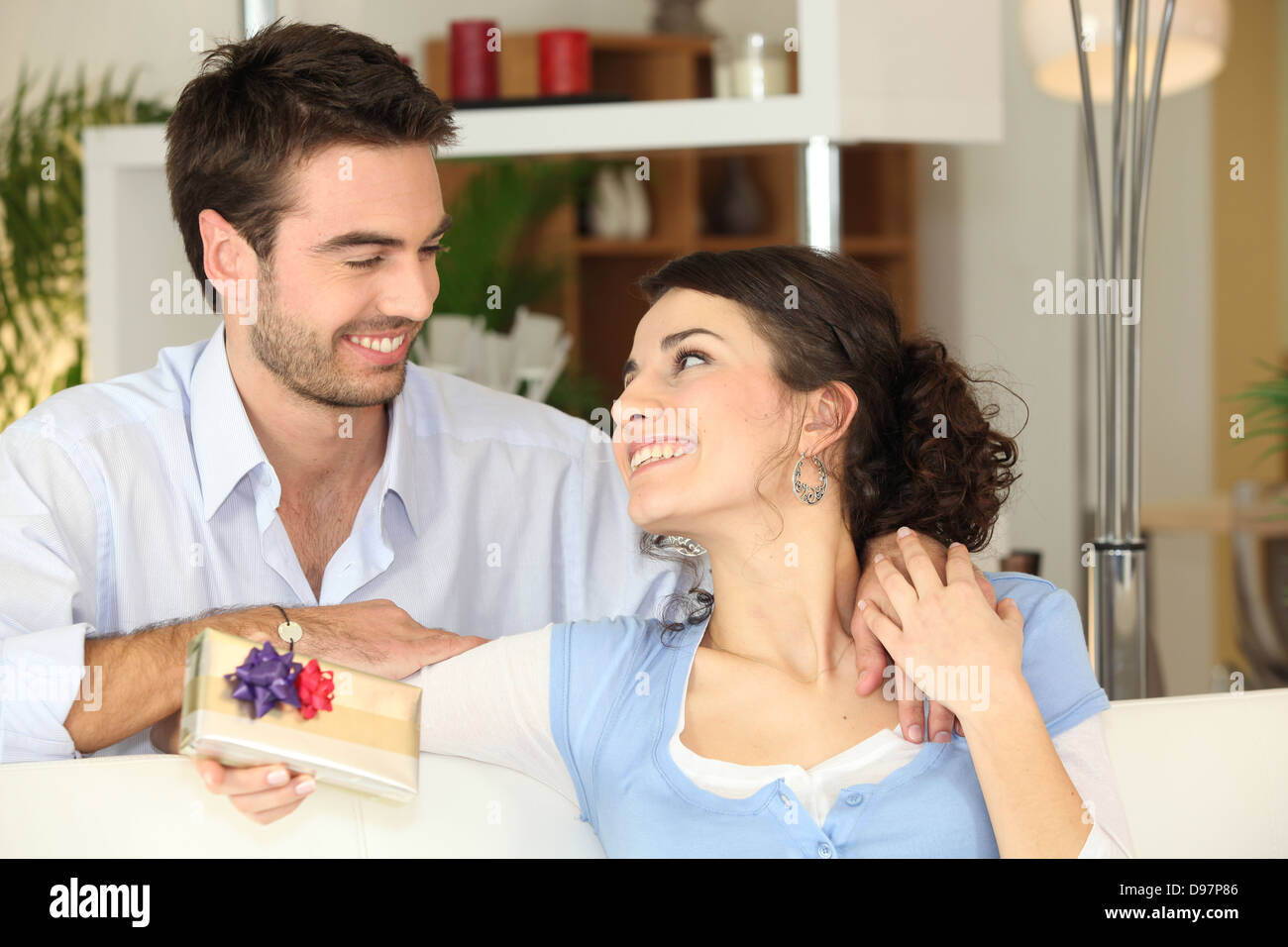 Woman receiving gift Stock Photo - Alamy
