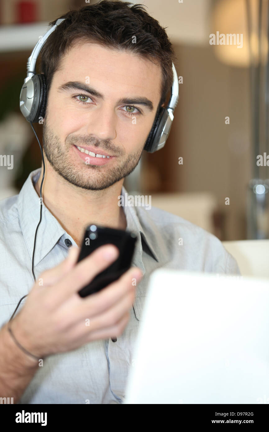 Man wearing headphones Stock Photo - Alamy