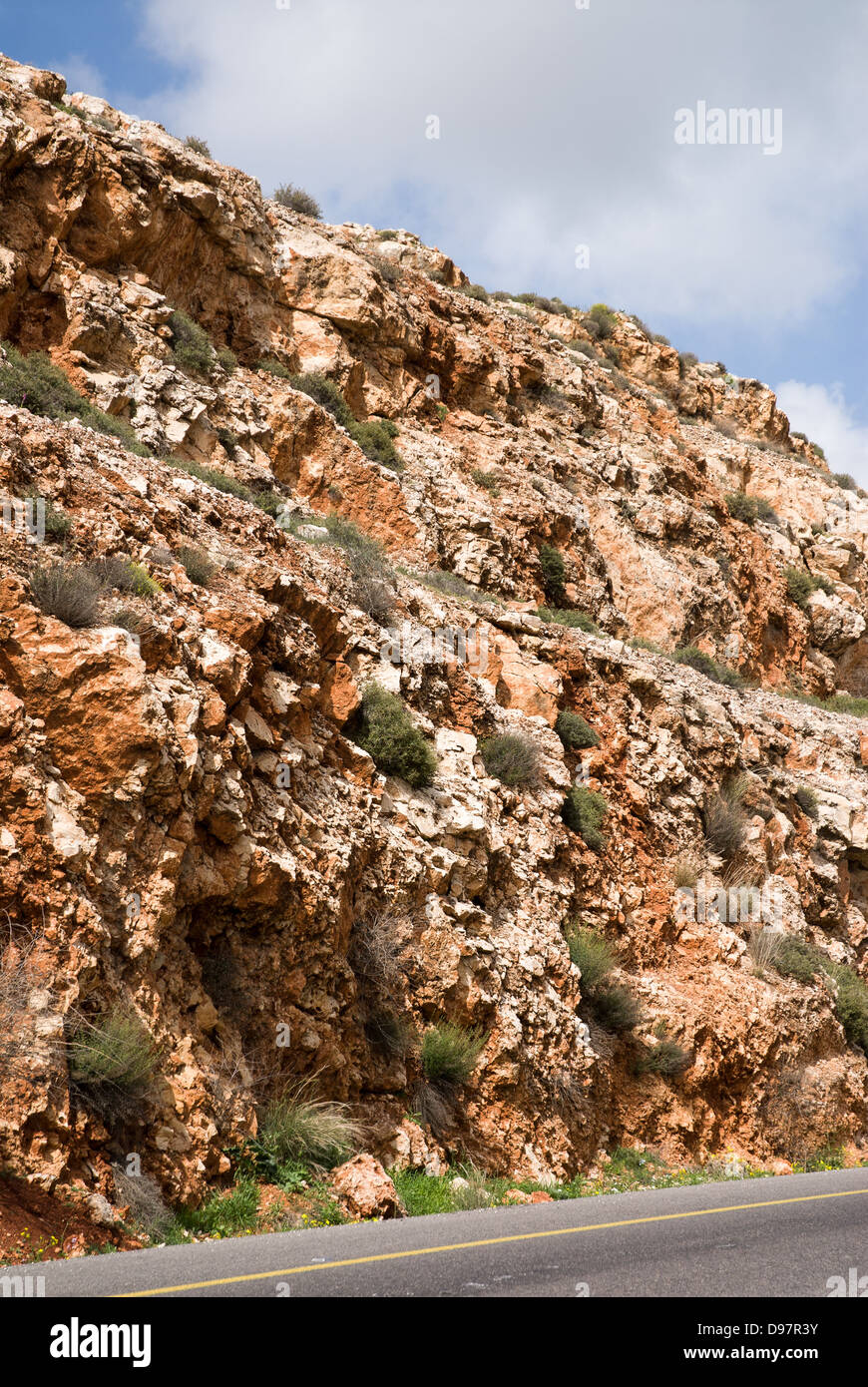 Road across red dolomite mountain in Israel Stock Photo - Alamy