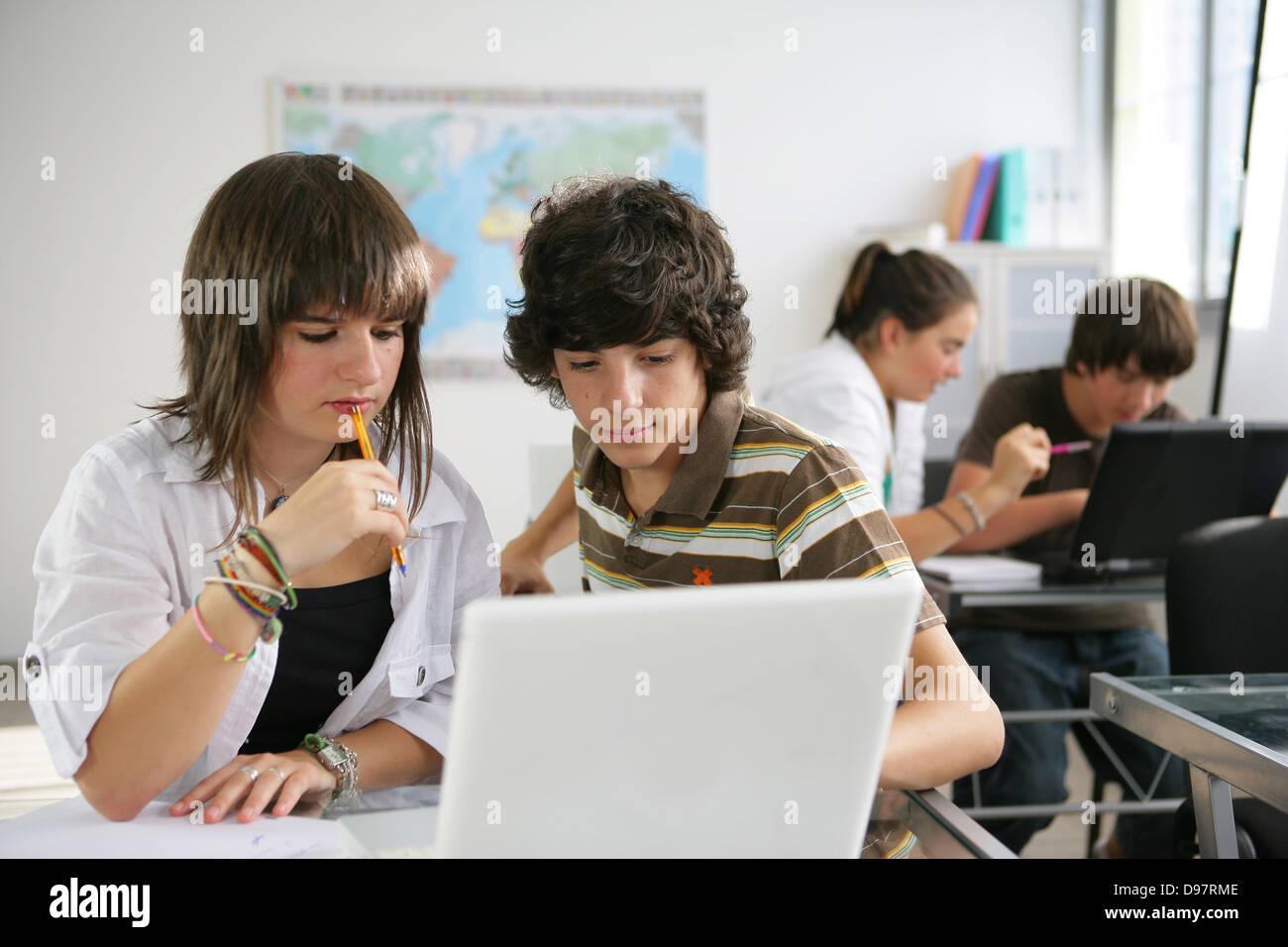 pupils studying in a classroom Stock Photo - Alamy