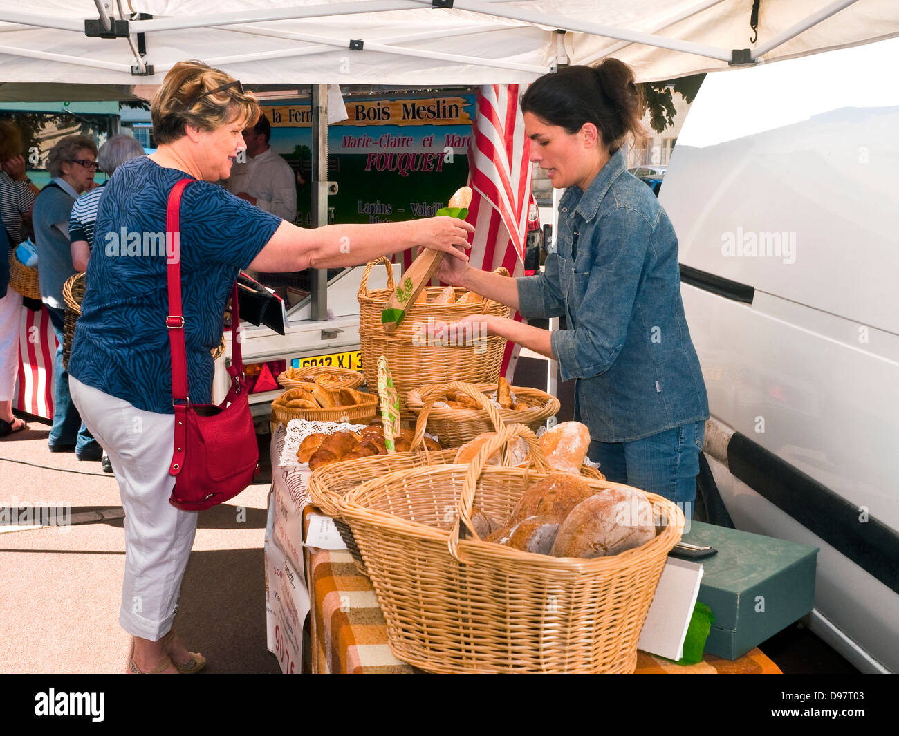 French woman with home-made bread stall - France Stock Photo - Alamy