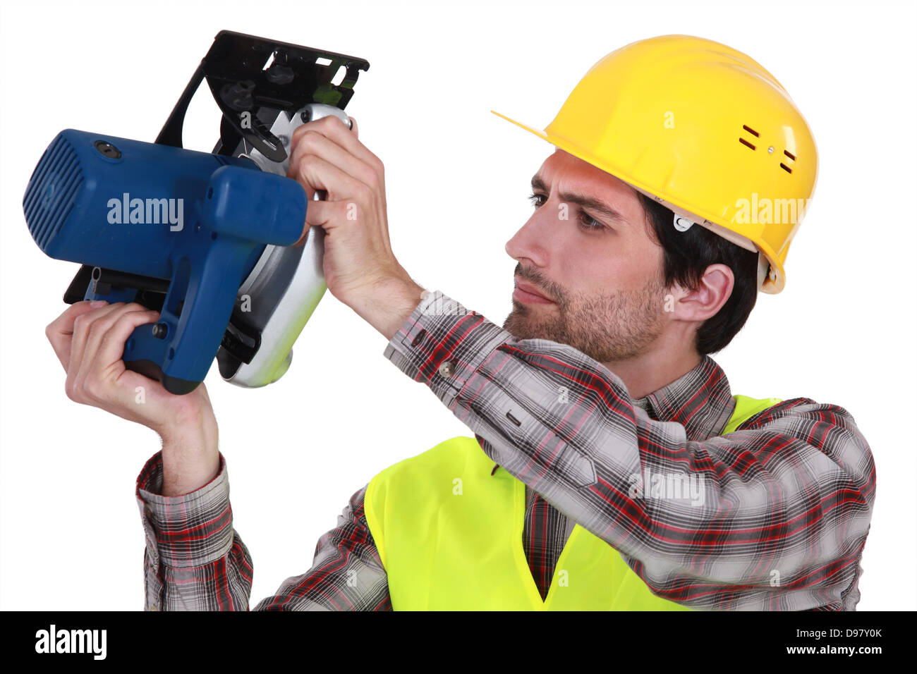 Craftsman holding electric cutter hi-res stock photography and images ...