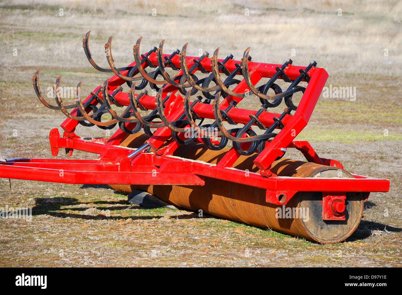 Red farm tool used to remove and flatten the farmland Stock Photo - Alamy