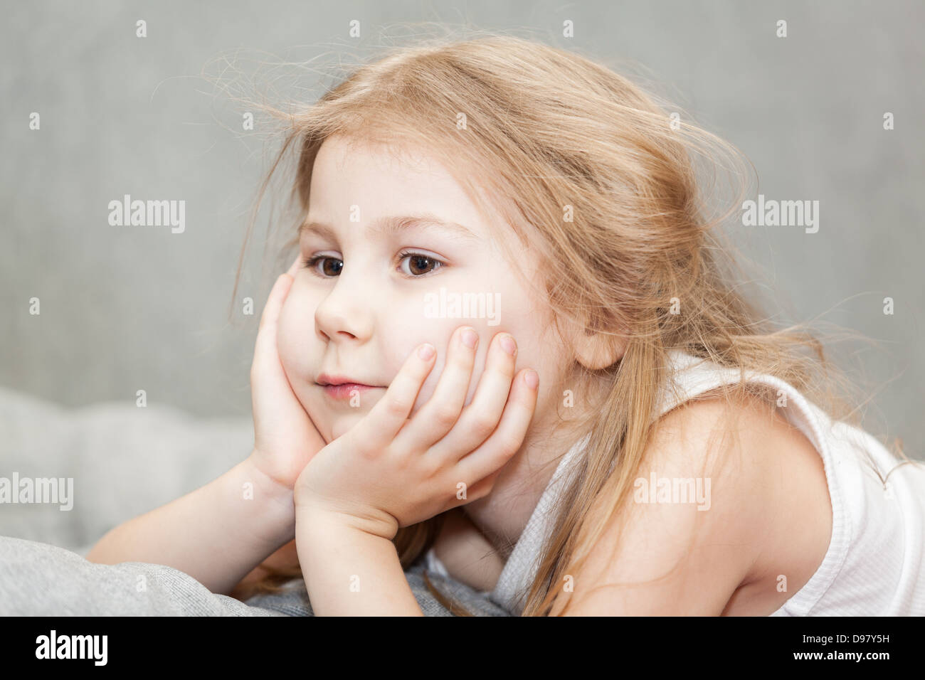 Girl supporting head hands hi-res stock photography and images - Alamy