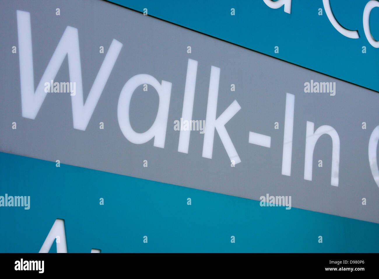 Walk-in care directional sign Stock Photo - Alamy