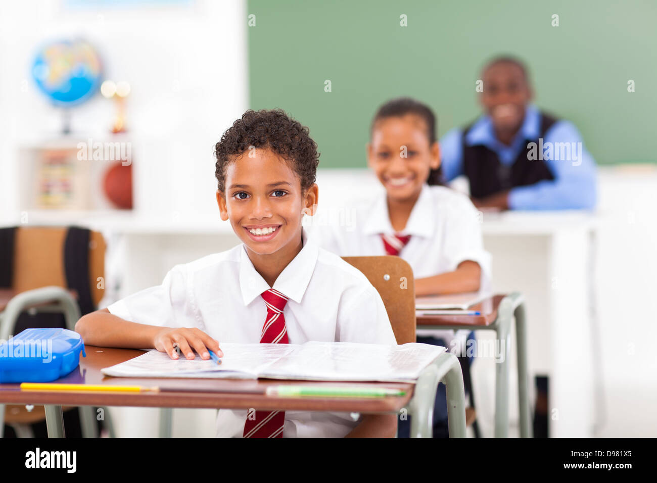 Students sitting desk classroom hi-res stock photography and images - Alamy