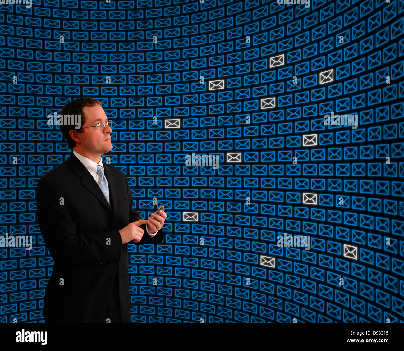 Man monitoring and tracking email message icons Stock Photo - Alamy