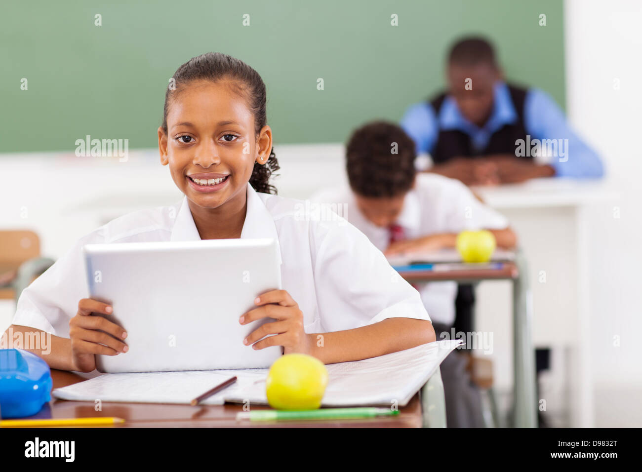 Using a tablet in classroom hi-res stock photography and images - Alamy