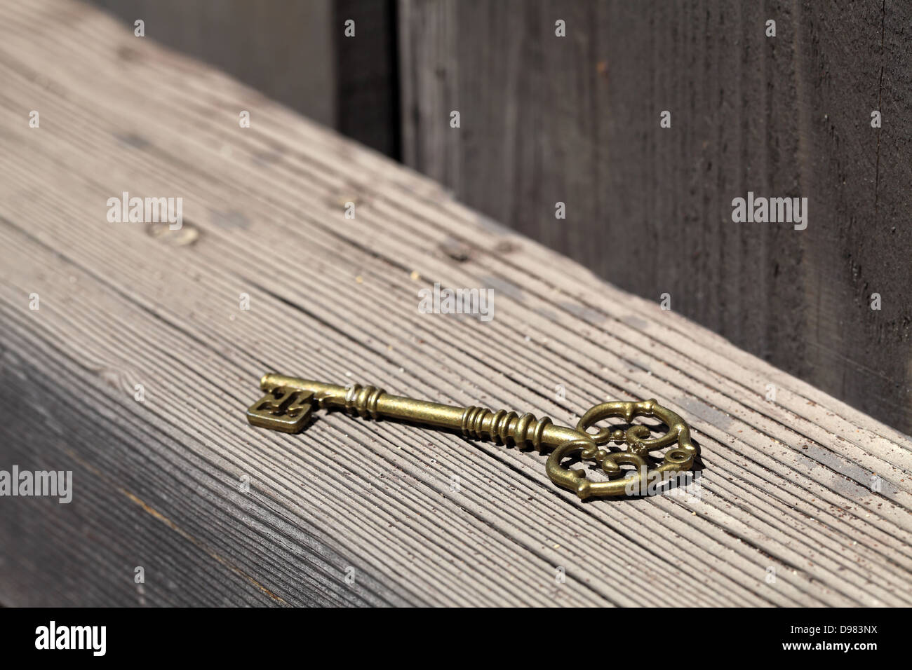 vintage golden key on shelf of barn Stock Photo - Alamy