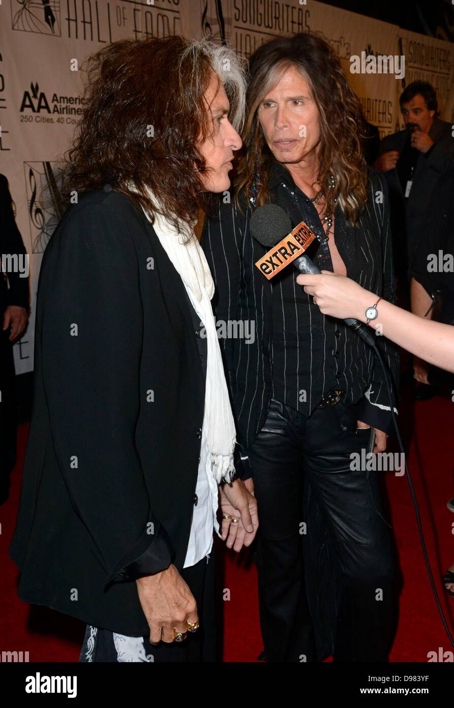 New York, USA. 13th June, 2013. Joe Perry and Steven Tyler of Aerosmith ...