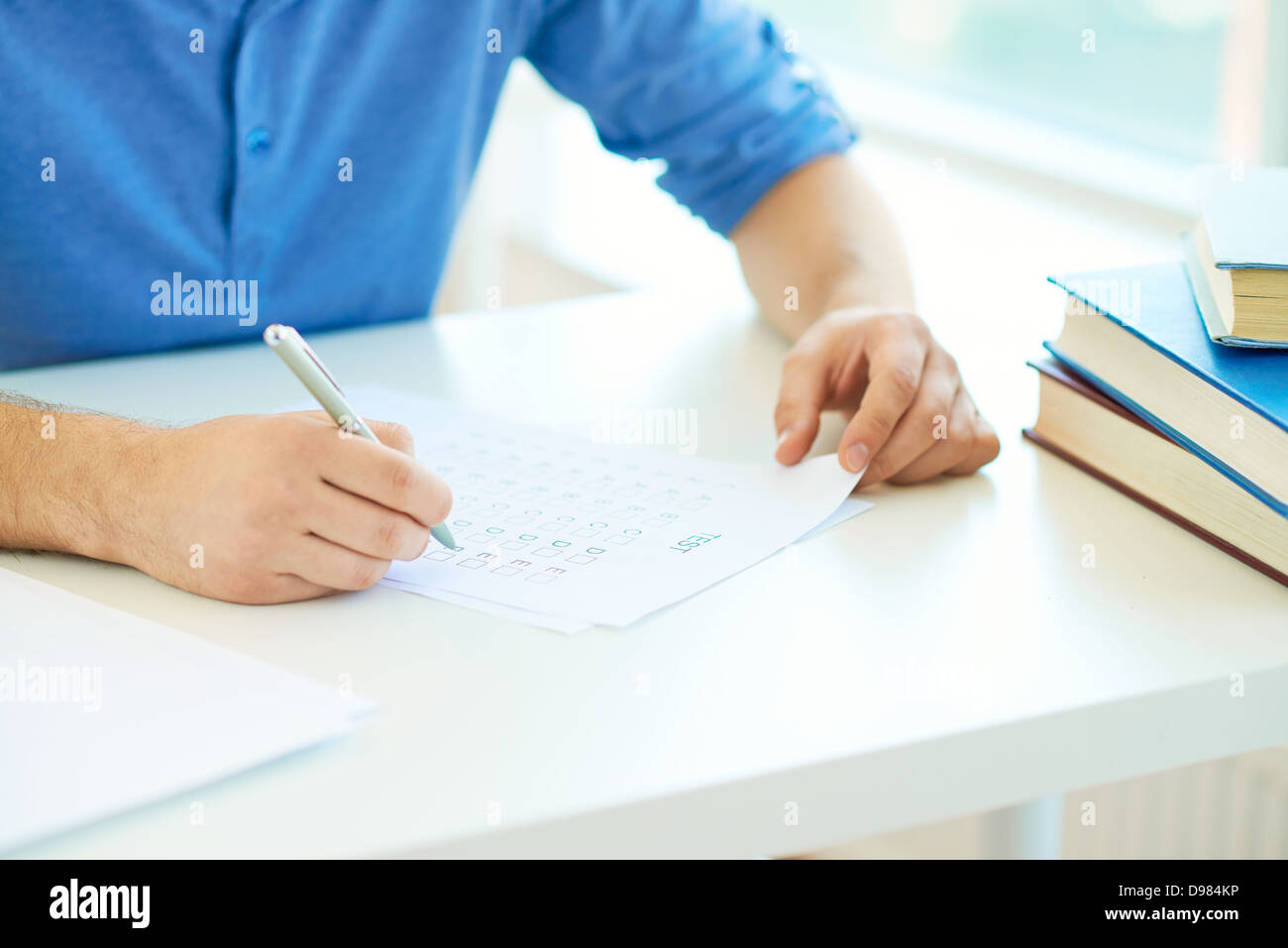 Closeup of student writing test hi-res stock photography and images - Alamy