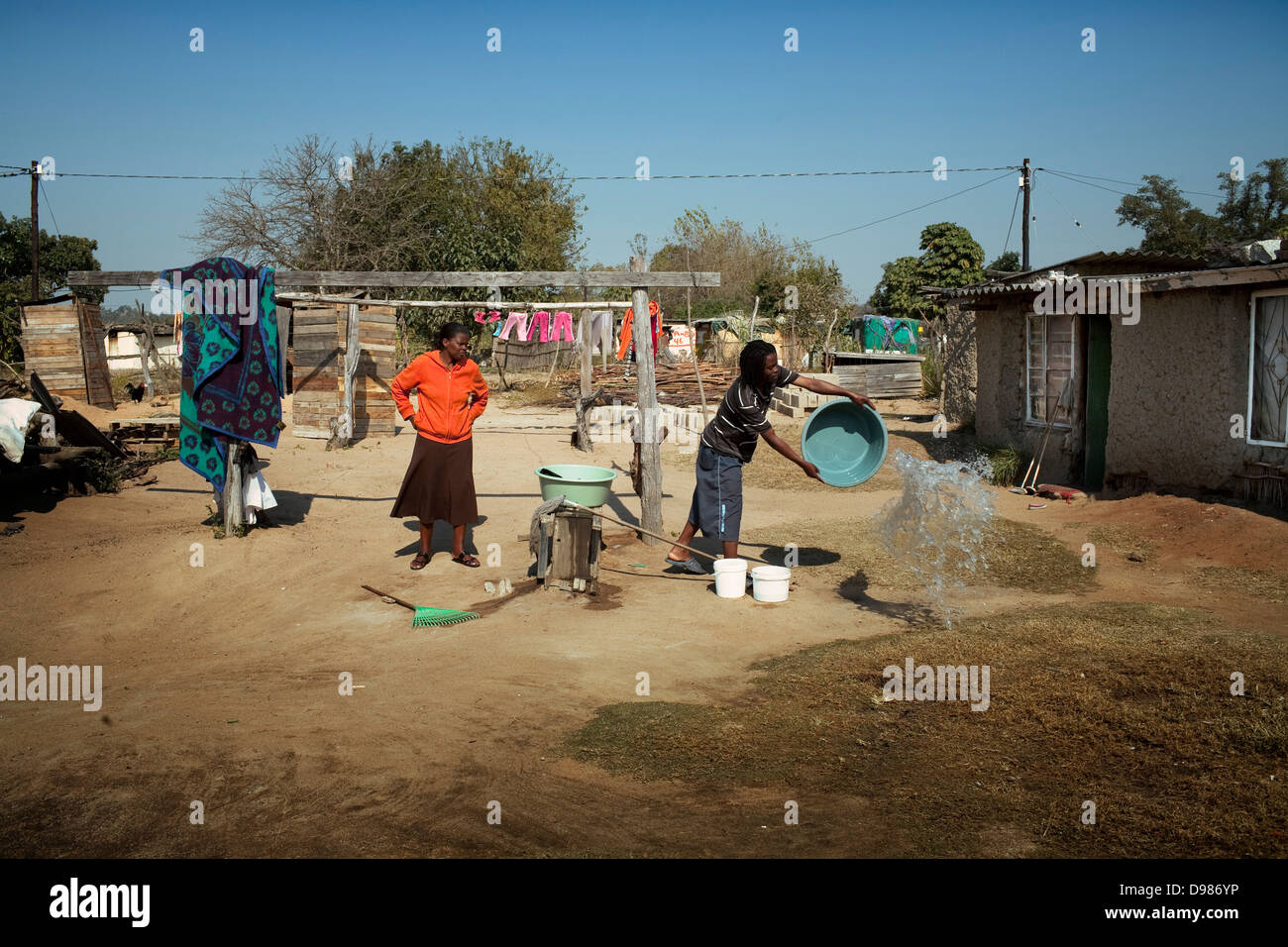 Esther Mbyame, 41, with her son at their home in Mataffin in Nelspruit ...