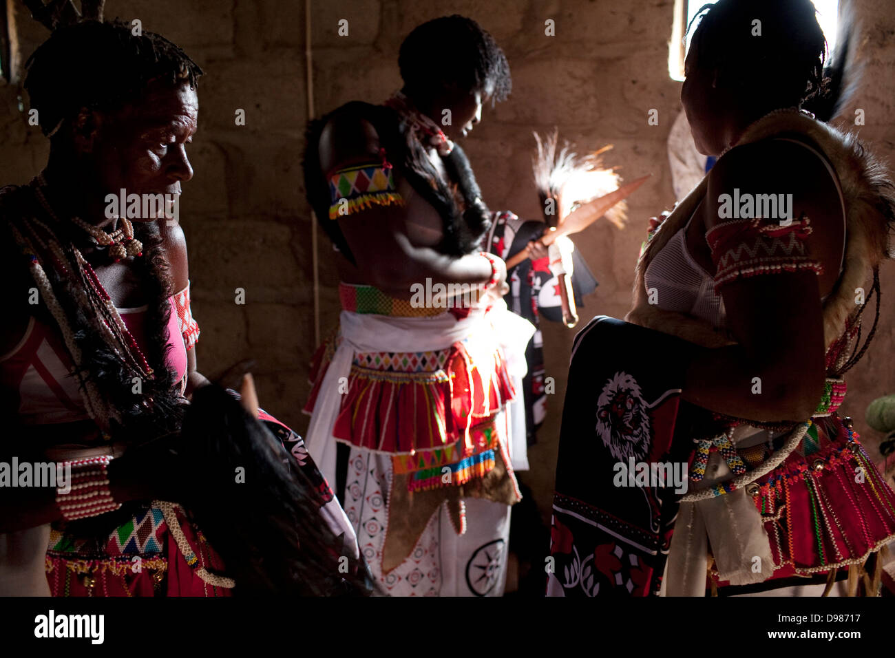 Jabsambo Ribbon Alina dress in traditional clothing during sangoma initiation ceremony in ...