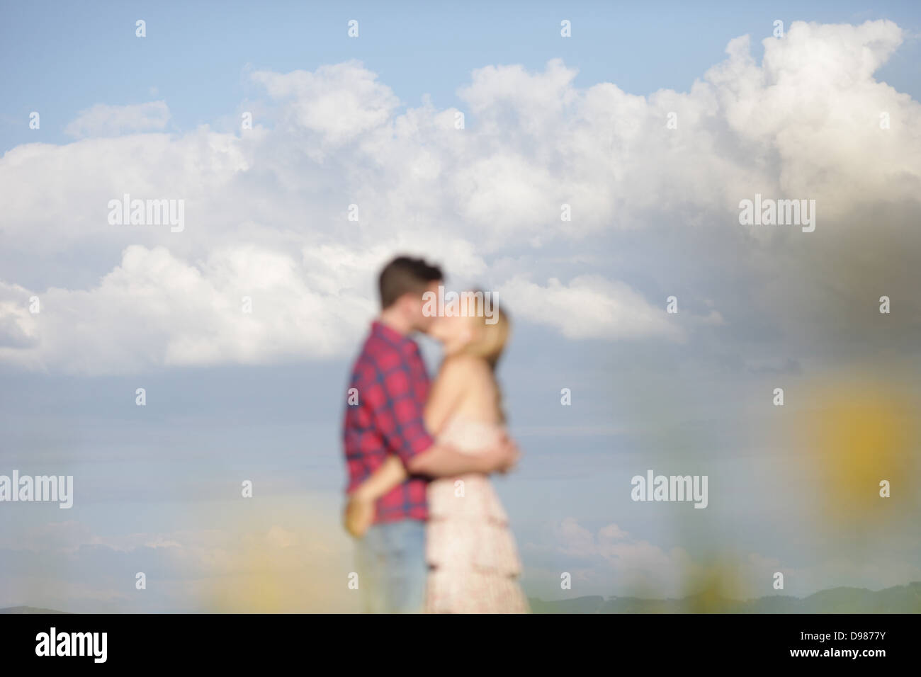 a young couple in a beautiful landscape Stock Photo - Alamy
