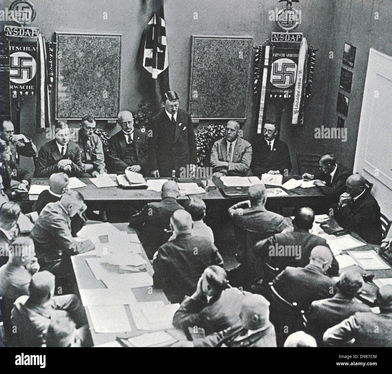Hitler in Munich adressing a meeting of the NSDAP in 1925. Third to the ...