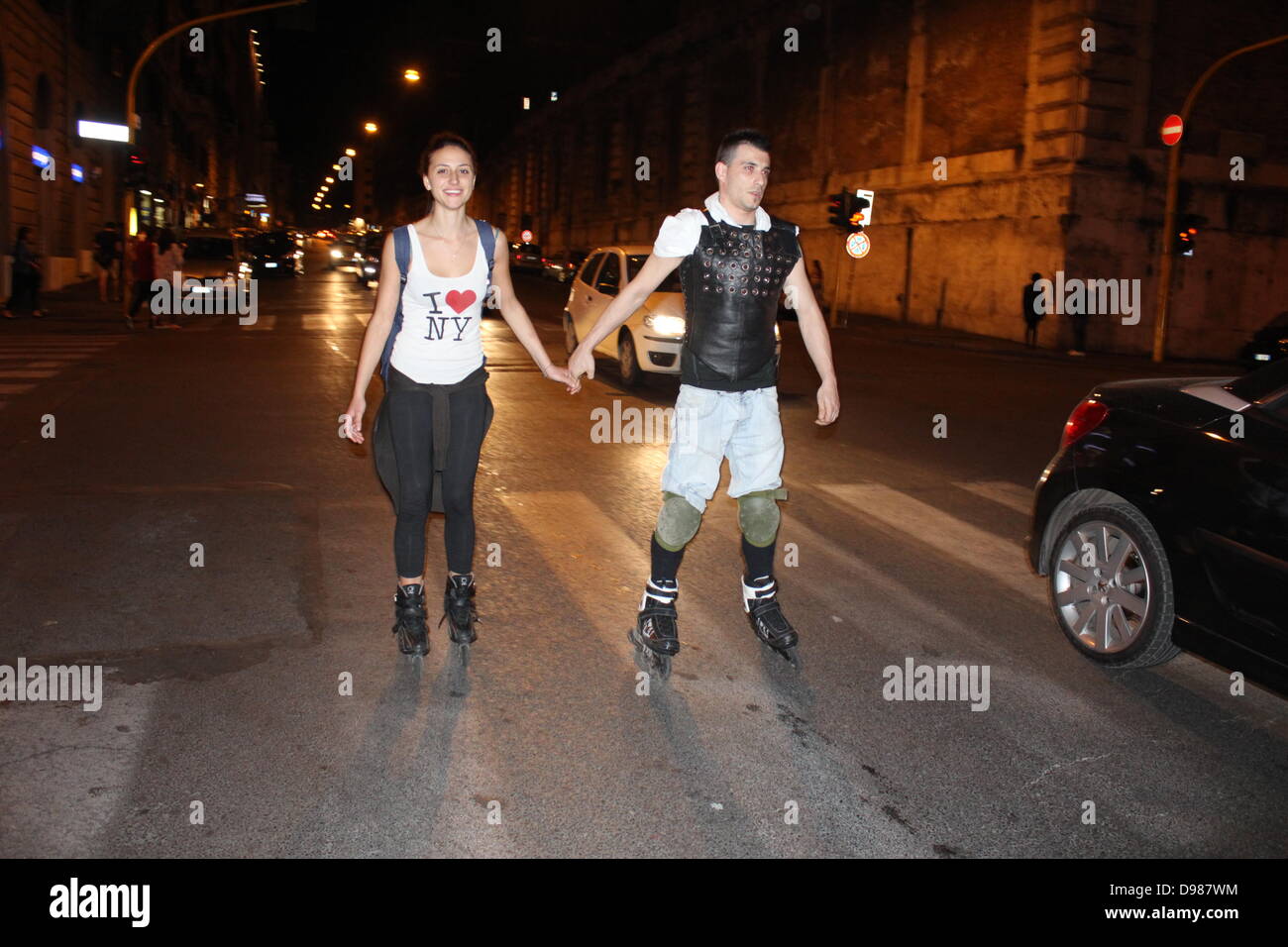 Rome, Italy. 12 June 2013 Rollerbladers in ancient Roman costumes on ...