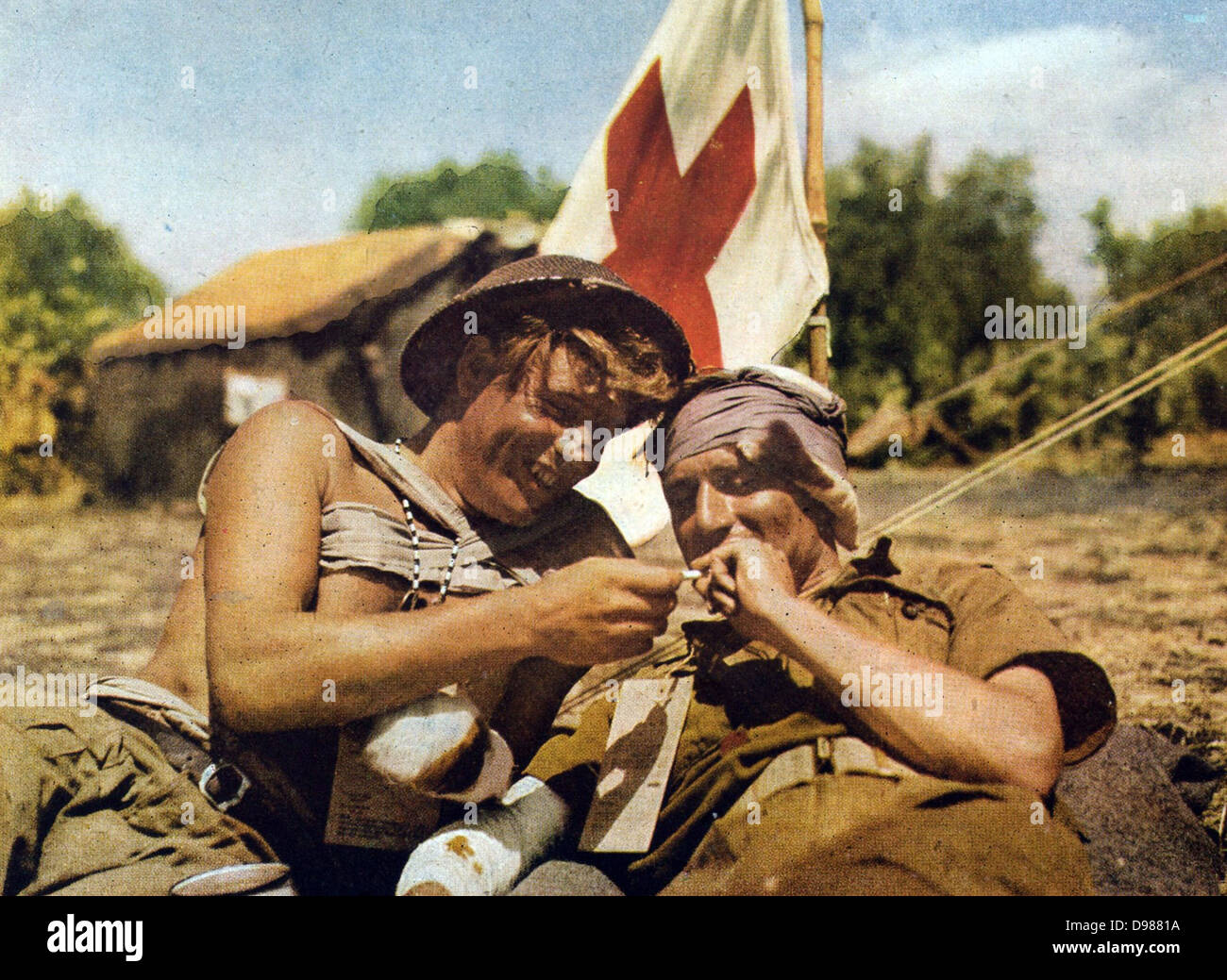 Two British wounded smile cheerfully as they wait to be evacuated from ...
