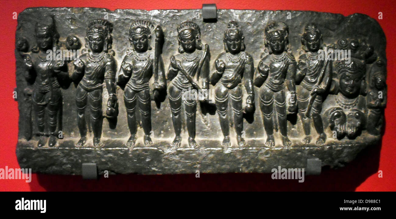 Planetary gods shown on an Indian stone relief, circa 1000-1200. The ...