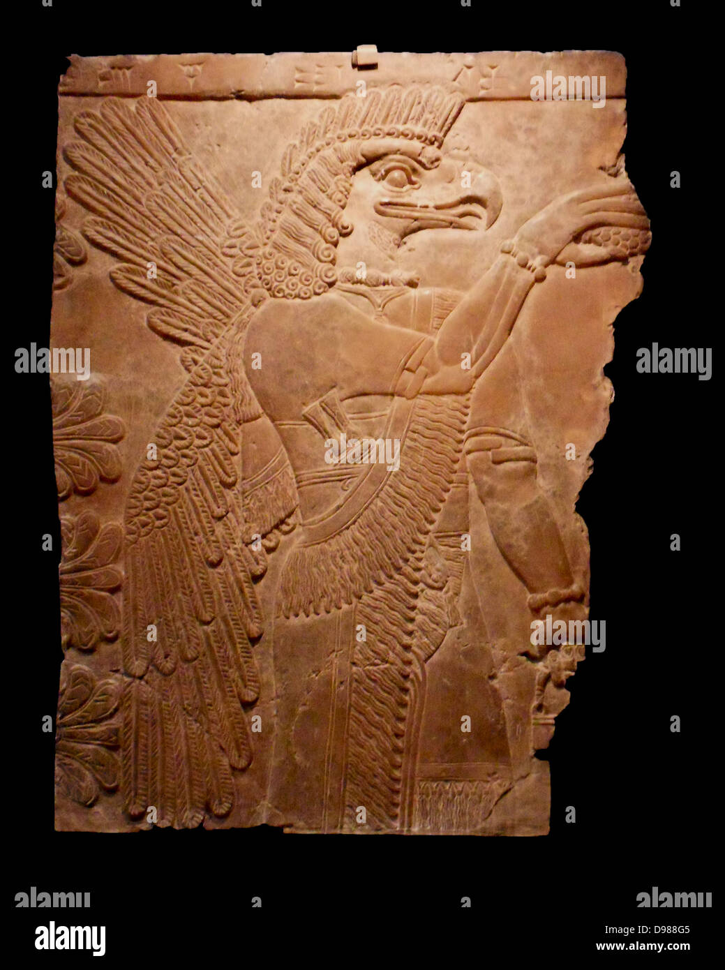Assyrian Winged Genie A four-winged genie in the act of pollination ...