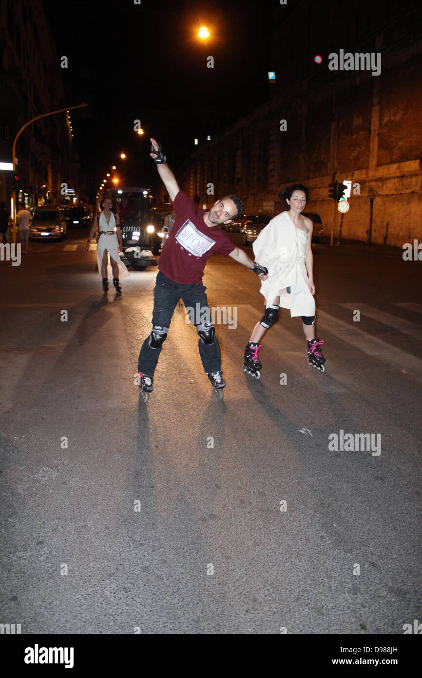 Rome, Italy. 12 June 2013 Rollerbladers in ancient Roman costumes on ...