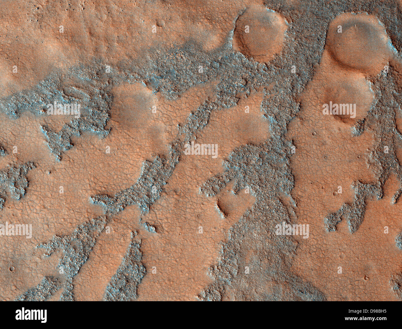 This image is of the floor of Antoniadi Crater on Mars. The dark ...