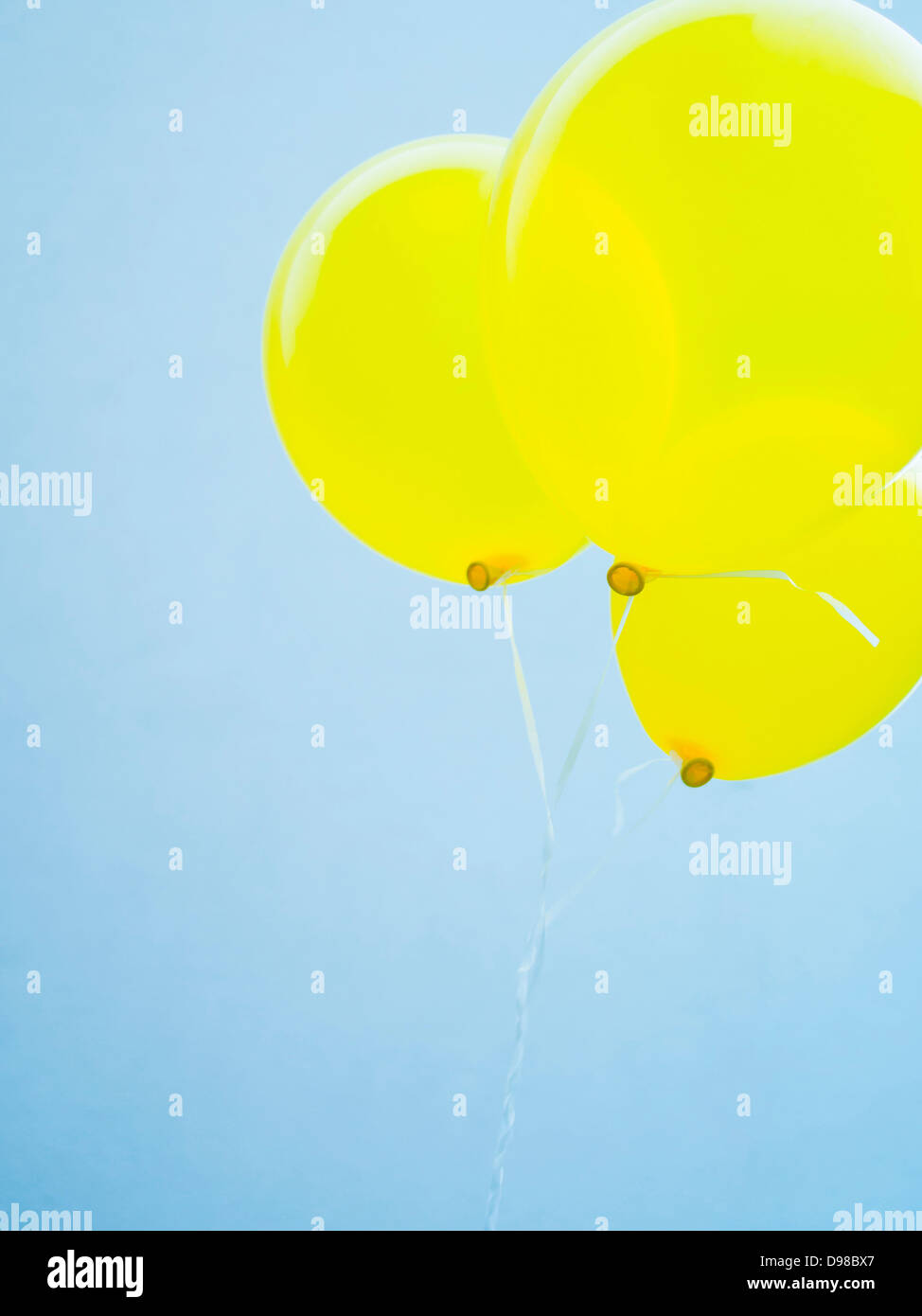 Blue and yellow balloons hi-res stock photography and images - Alamy