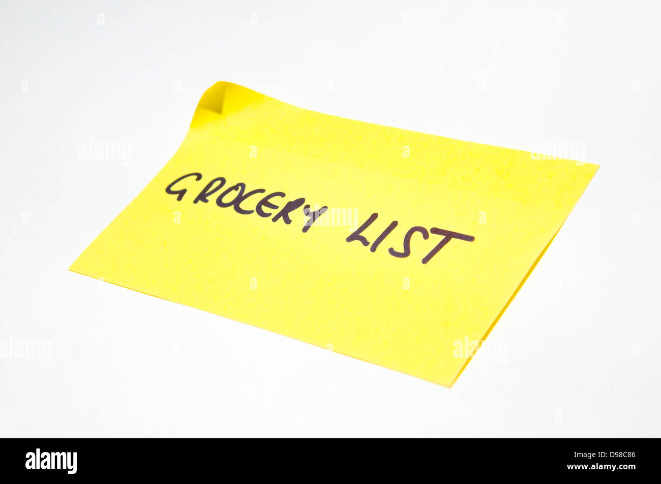 'Grocery list' written on a yellow post it note Stock Photo - Alamy