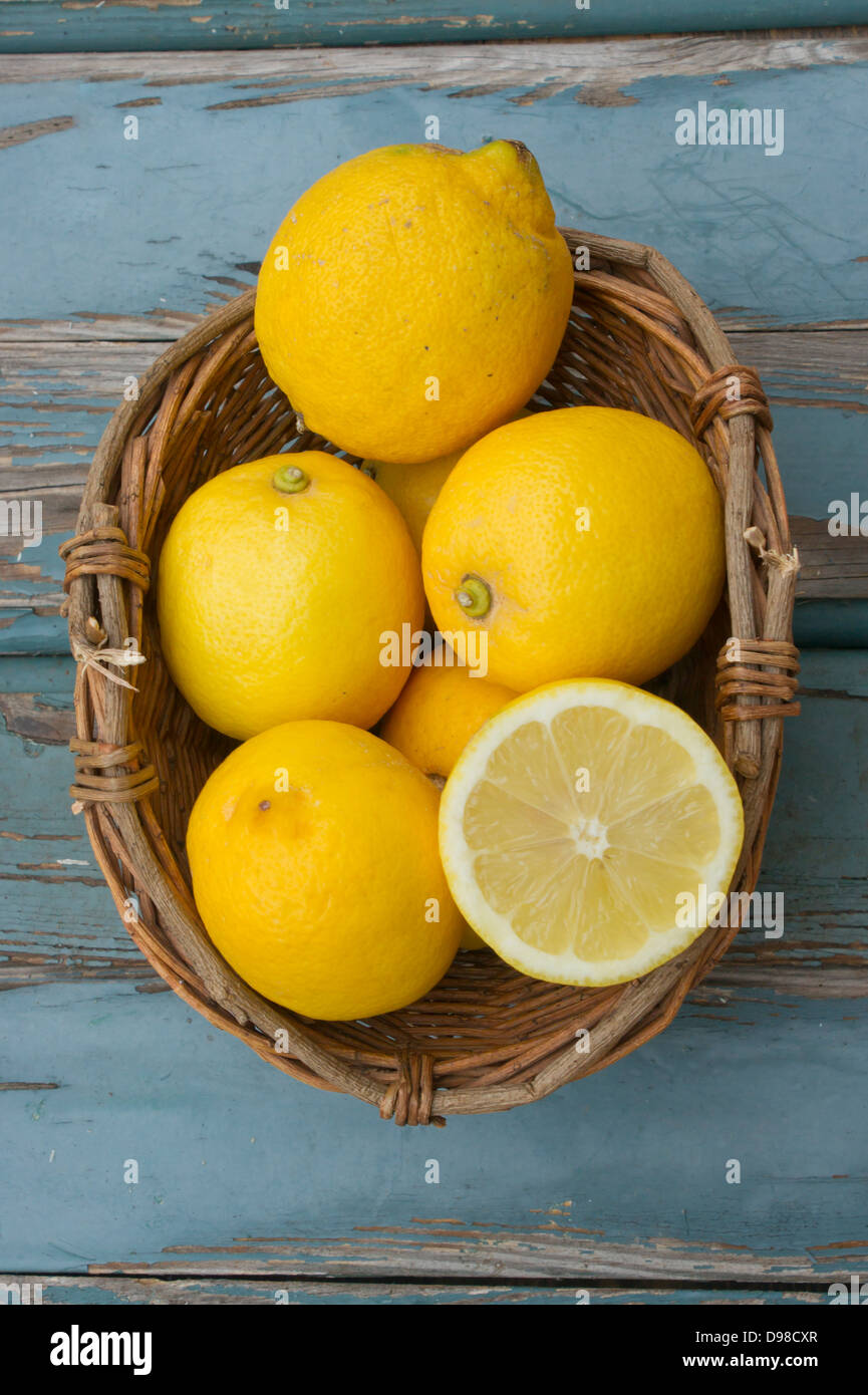 Basket full of lemon, close up Stock Photo - Alamy