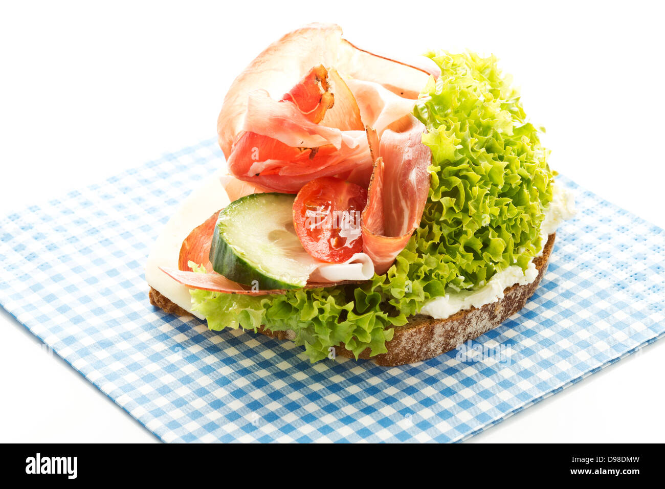Fitness sandwich with cream cheese, ham, tomatoes and cucumber, close ...