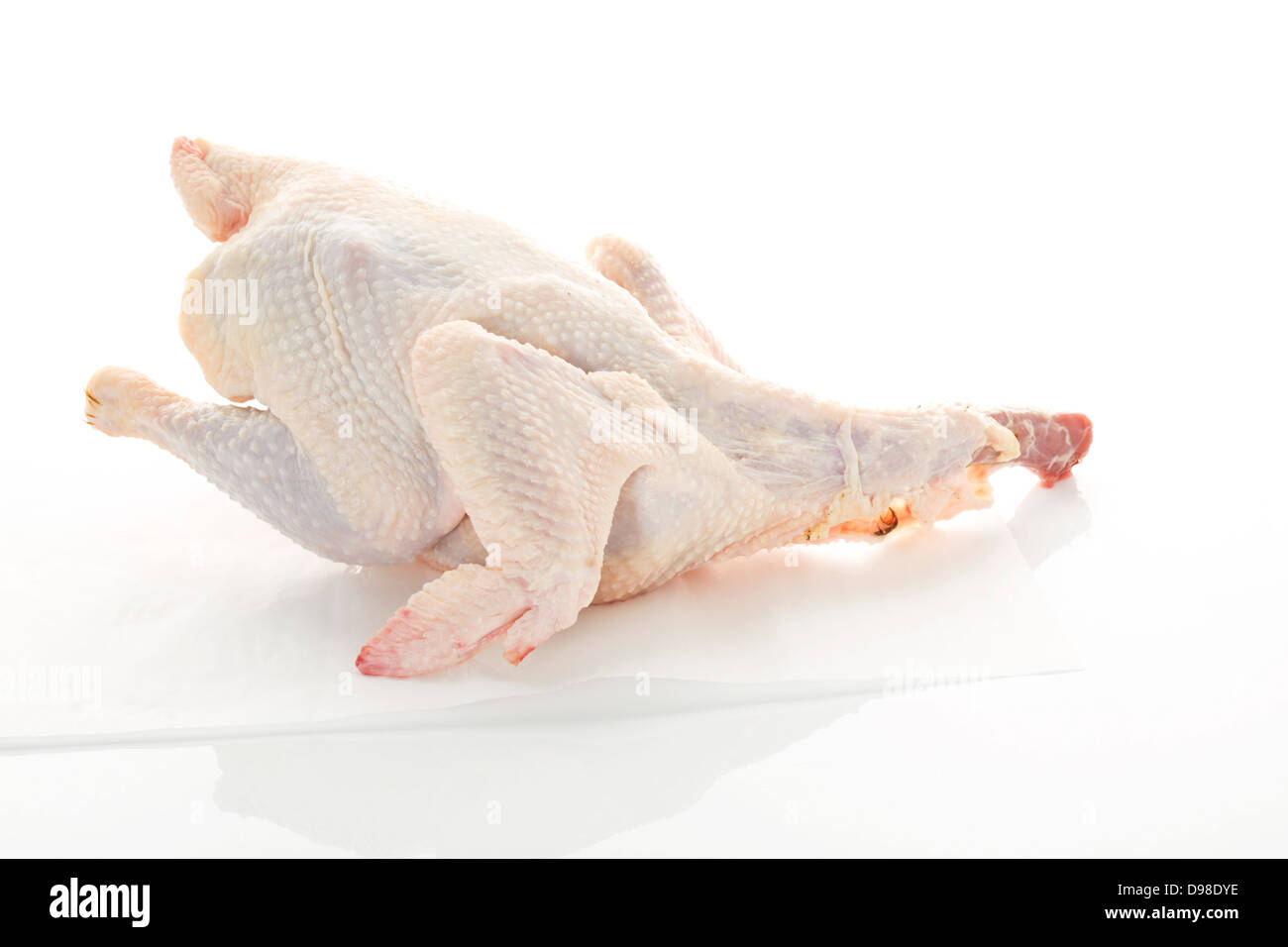 Boiling fowl on kitchen paper, close up Stock Photo - Alamy