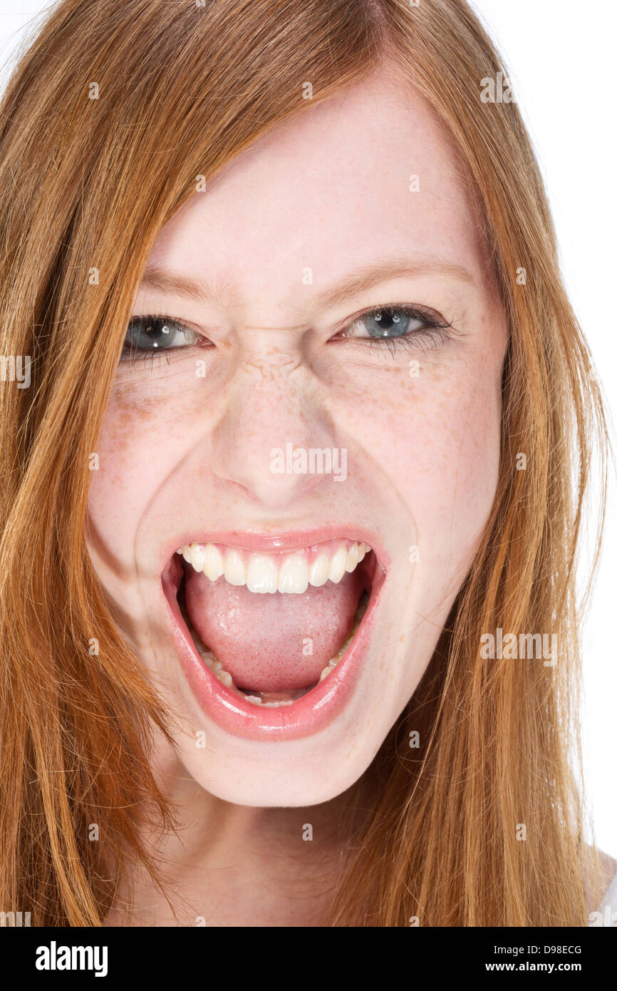 Portrait of young woman shouting, close up Stock Photo - Alamy
