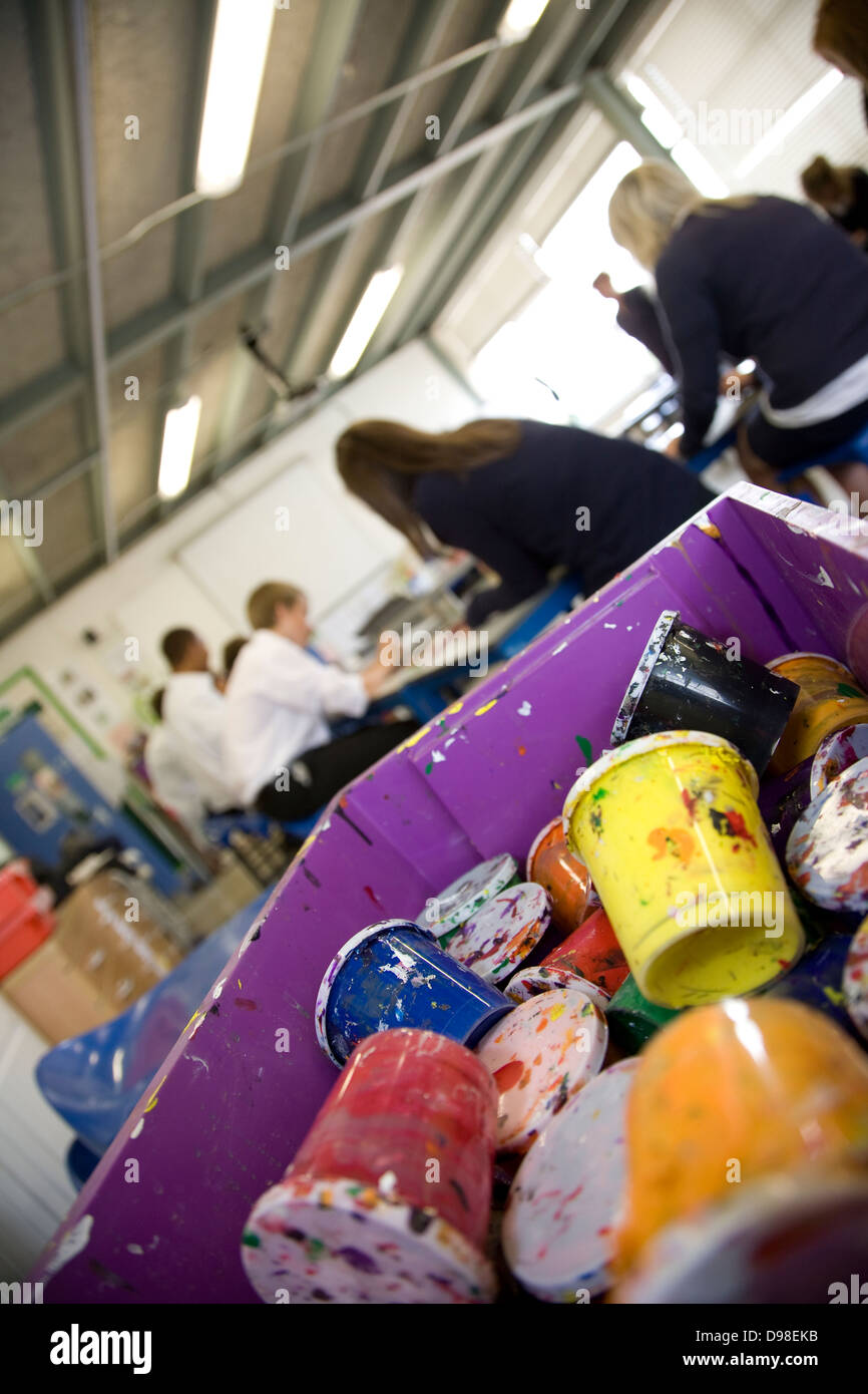 School art room showing tray of coloured paints in the foreground and ...