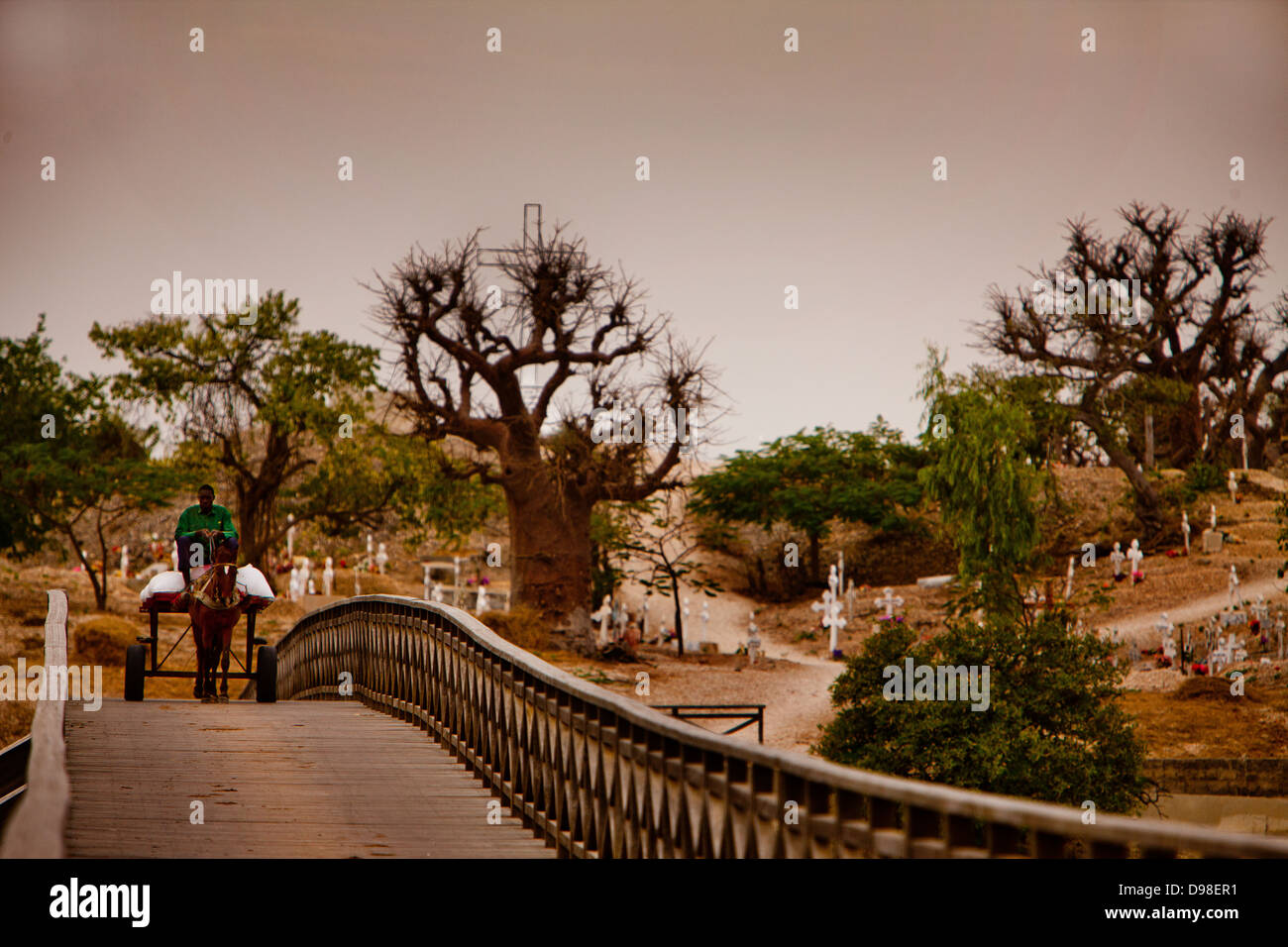 A clam-shell island, linked to Fadiouth in Senegal by a bridge is home ...