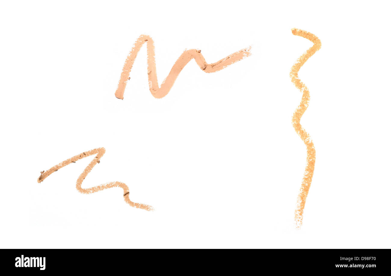 squiggle of foundation cut out onto a white background Stock Photo - Alamy