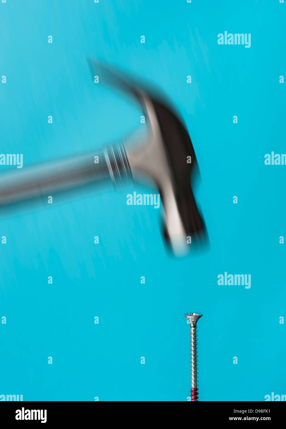 Hammer hitting screw hi-res stock photography and images - Alamy