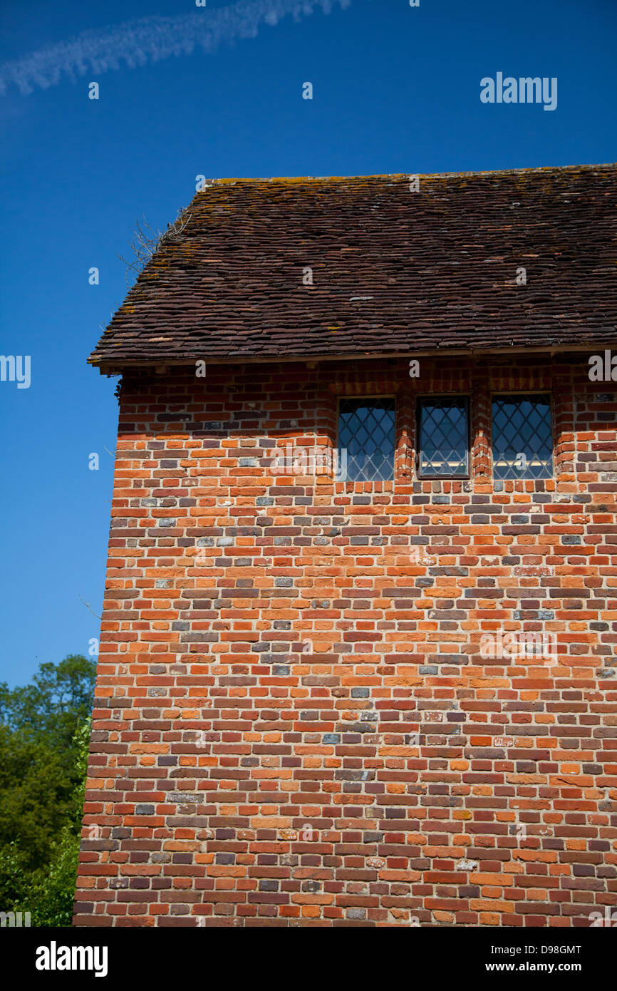 Detail of 17th century brick built house with diamond leaded windows ...