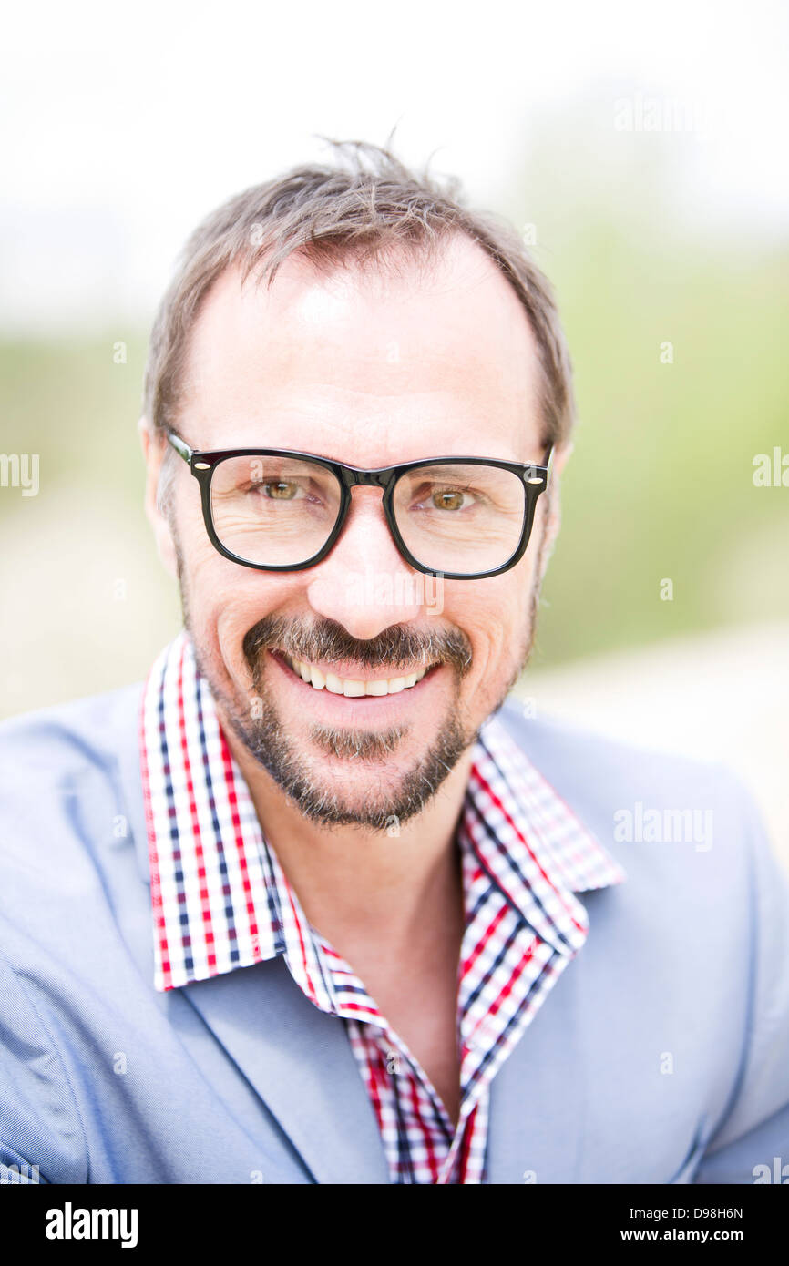 Germany, Bavaria, Portrait of businessman, smiling Stock Photo - Alamy