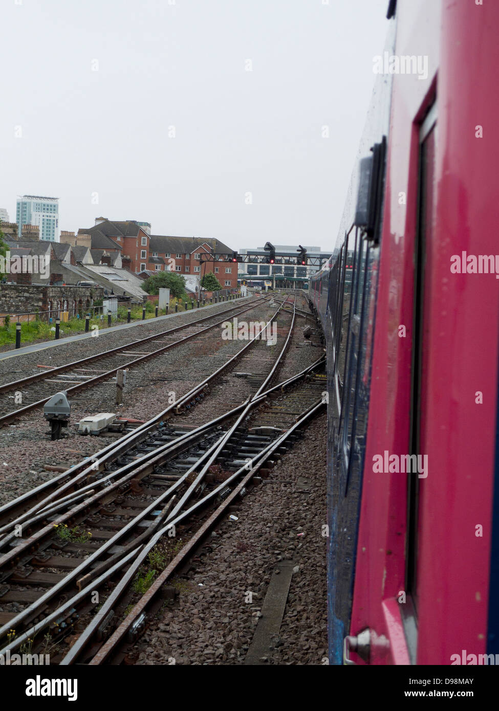 View of the track and side of a Great Western train approaching Cardiff ...