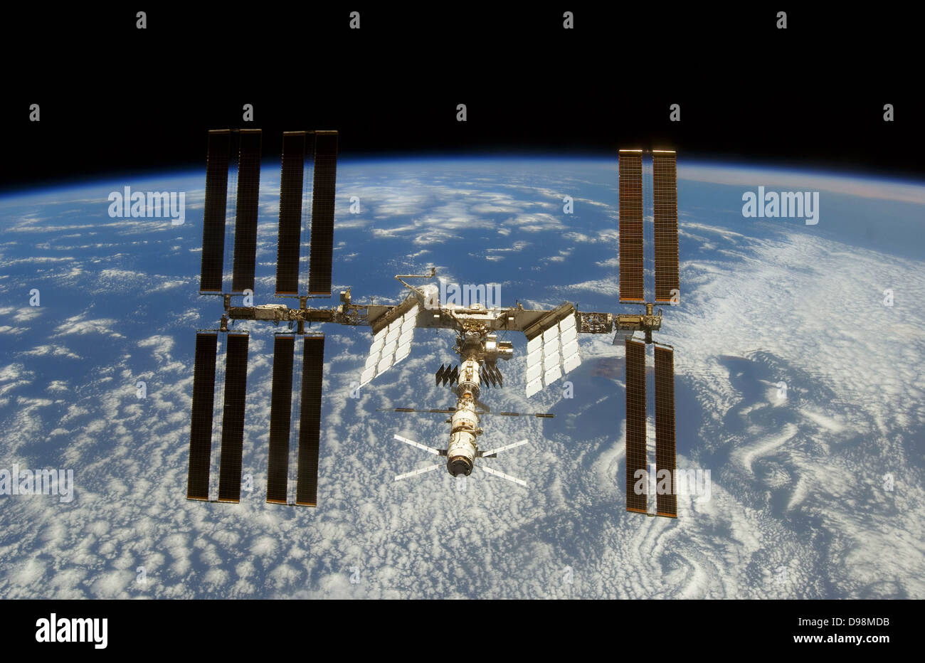 The International Space station in orbit over the earth Stock Photo - Alamy