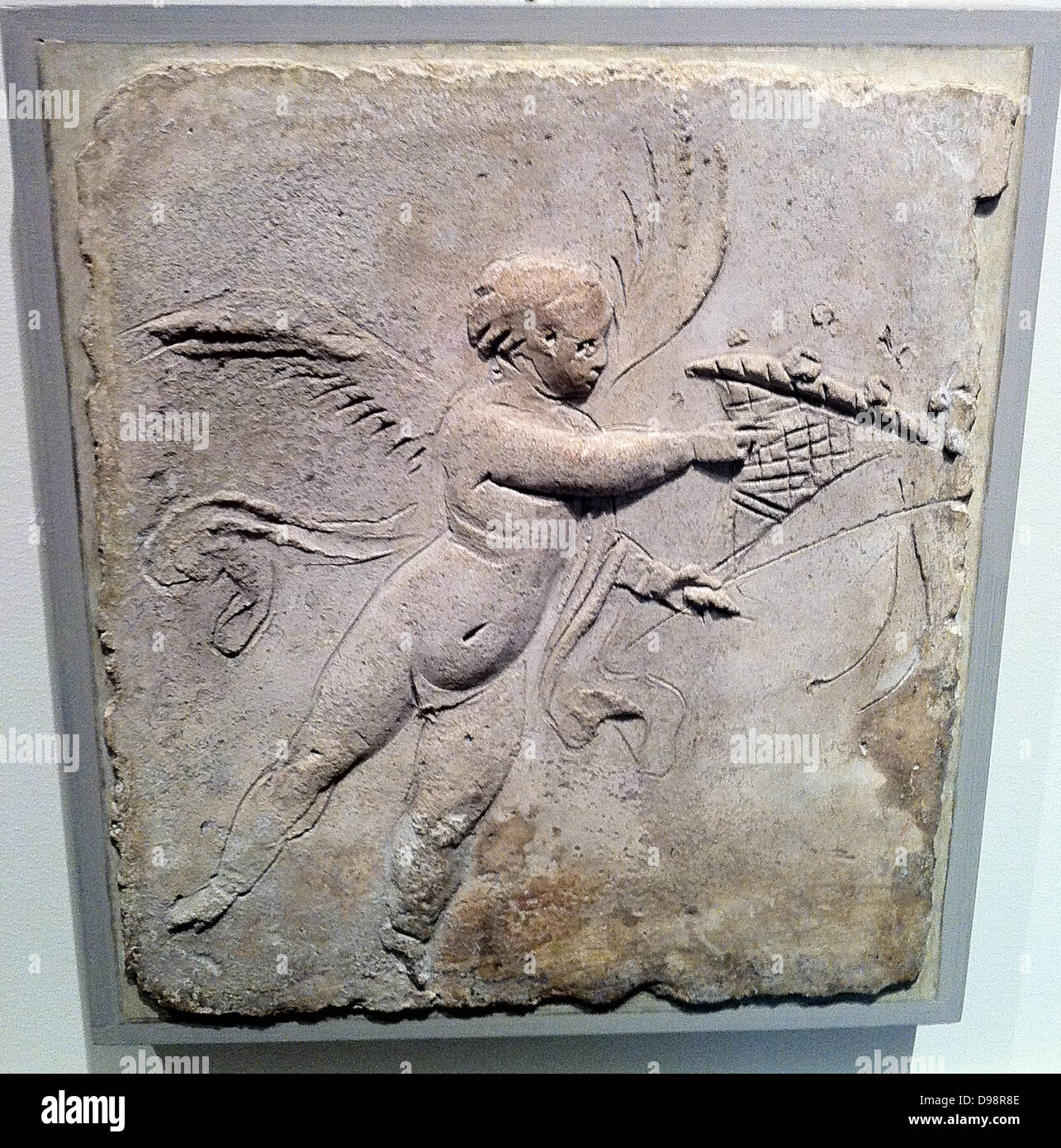 Stucco relief (Roman) depicting Eros. 1st Century AD Stock Photo - Alamy