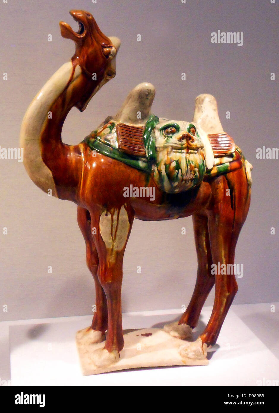 Chinese glazed earthenware figure of a Camel. Tang dynasty (618–907 ...
